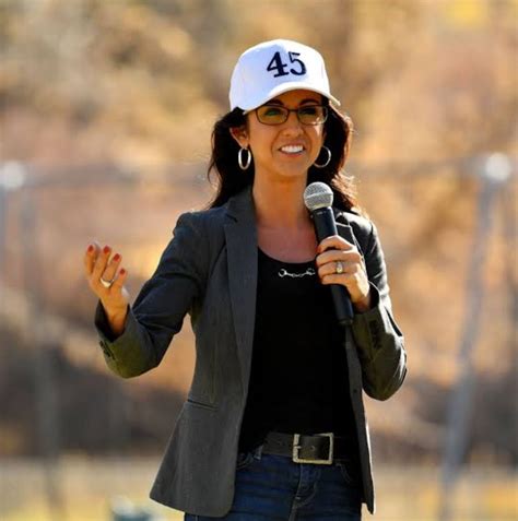 Photo Lauren Boebert Giving Speech While Wearing 45 Hat For Donald