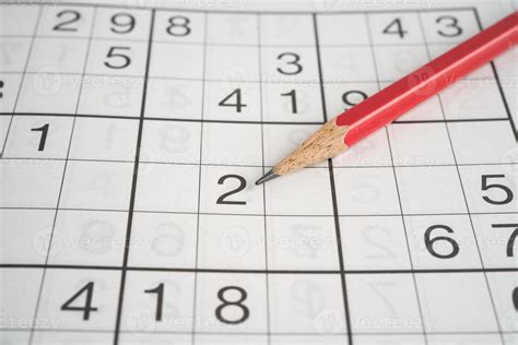Sudoku Puzzle Game Playing To Challenge Brain Stock Photo At Vecteezy