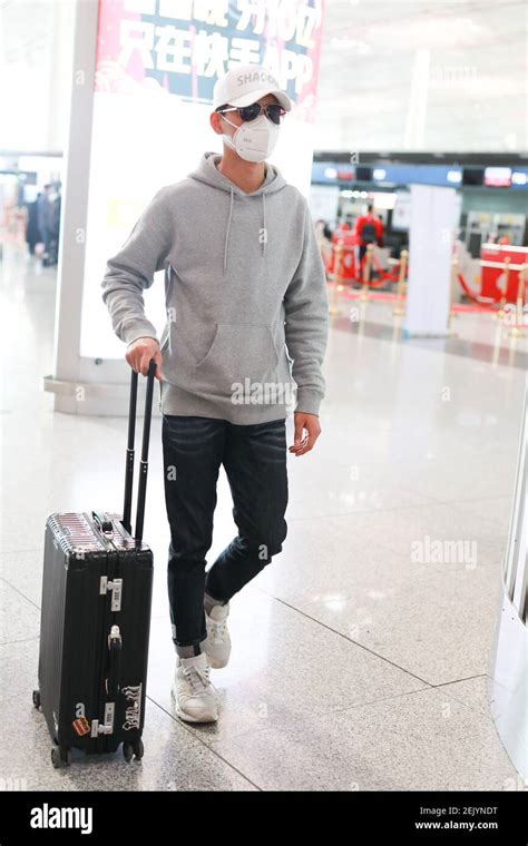 Chinese Actor Qiao Zhenyu Arrives At A Beijing Airport Before Departure In Beijing China 12