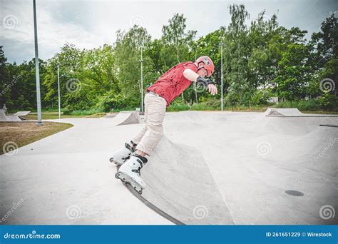 Closeup Shot Of An Inline Skater In A Skating Rink Practicing Moves