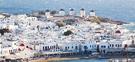 화창한 여름 날 미코노스 Cyclades를 그리스 미코노스 타운 항구 위의 언덕에서 유명한 풍차와의 파노라마 보기 건축에 대한 스톡 사진 및 기타 이미지 Istock