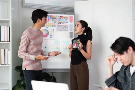 Design Collaboration And Communication Team Members Engaging In A Discussion About Design