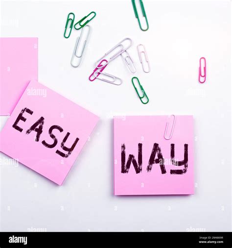 Sign Displaying Easy Way Word Written On Making Hard Decision Between Two Less And More Effort