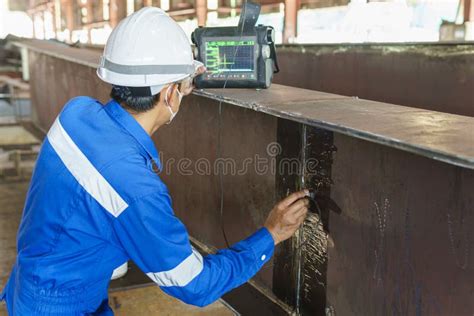 Inspectors Are Checking Defects In Welded Steel H Beam Add Joint With Process Ultrasonic Testing