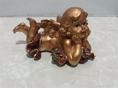 Статуетка ангел з трояндами — ціна 220 грн у каталозі Статуетки Купити товари для дому та
