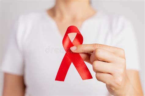 Closeup Woman Hand Holding Red Ribbon Hiv World Aids Day Awareness