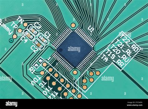 Microprocessor On A Green Printed Circuit Board Close Up Top View