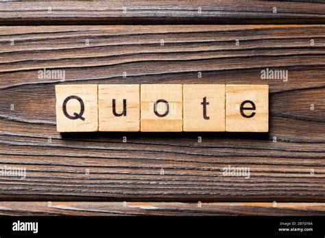 Quote Word Written On Wood Block Quote Text On Wooden Table For Your Desing Concept Stock