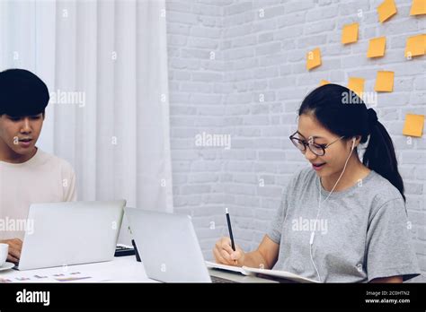 Man Woman Colleagues Using Computer Startup Teamwork Coworking Team Working At Home Office