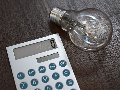 Light Bulb And Calculator Stock Image Image Of Glass 45951489