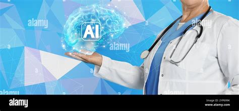 Artificial Intelligence Health Worker Holding Virtual Brain With Ai Abbreviation On Light Blue
