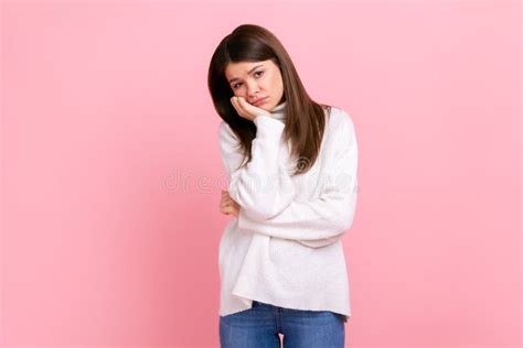 Bored Girl Look At Camera With An Incredulous Disappointed Emotions On