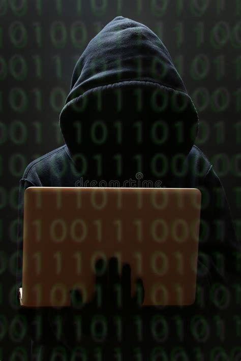 silhouette of a hacker looking in monitor stock image image of