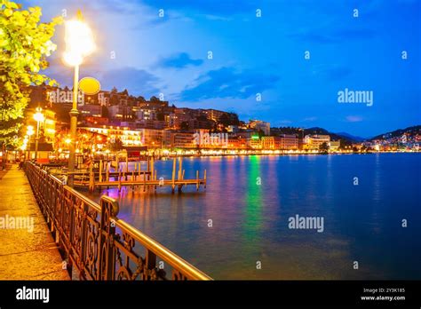 Lugano Lake And Lugano City Panoramic View In Canton Of Ticino In