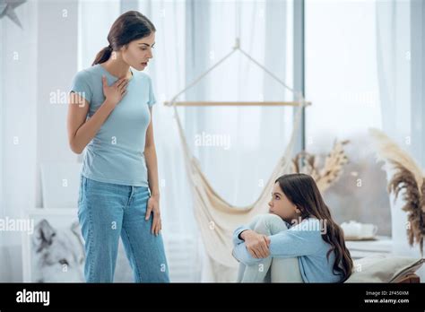 Mom Conducting Educational Conversation With Naughty Daughter Stock