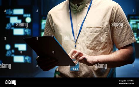 Engineer In Data Center Setting Up High Bandwidth Dedicated Multiplayer Online Gaming Servers To