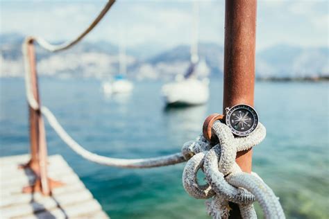 Premium Photo Sailing Nautical Compass On A Sailing Rope Pier Sailing