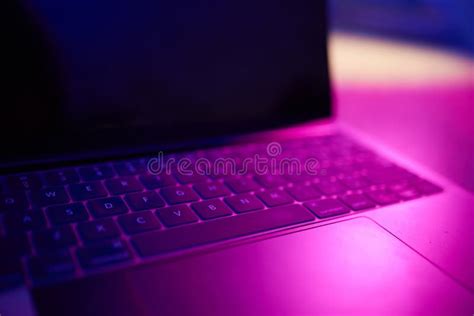 Laptop Keyboard Or Technology In Basement In Dark Room At Night For