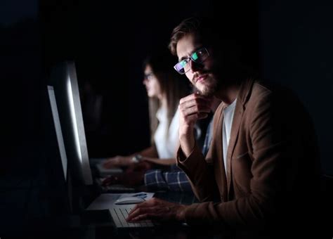 Premium Photo Serious Programmer Looking At The Computer Screen