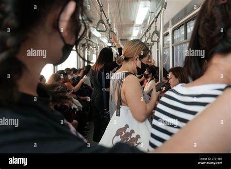 Manila Philippines Filipino Commuters Inside A Cabin In A Moving Lrt