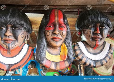 Wooden Masks Of Native Amazonian People At A Curio Stall Location