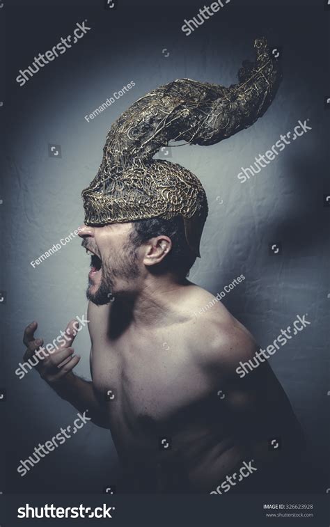 Naked Man Helmet Warrior Trumpets Pain Stock Photo 326623928 Shutterstock