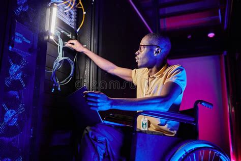 System Admin In Neon Server Room Stock Image Image Of Communication Server 250350903