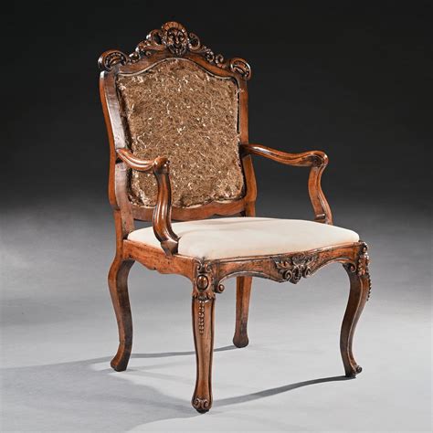 Mid 18th Century Italian Rococo Armchair In Walnut With Extravagantly