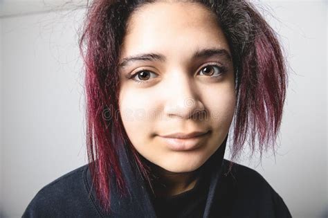 Girl Doing Different Expressions In Studio Background Stock Image