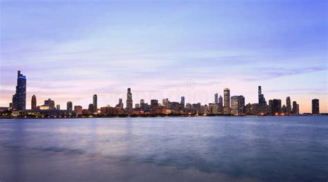 Chicago Skyline At Sunset With Lake Michigan On The Foreground Stock