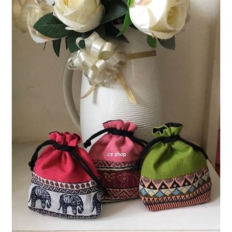 ของขวัญปีใหม่ ของชำร่วย ของที่ระลึก งานแต่ง งานบวช ถุงผ้าแบบหูรูดทำจากผ้าทอพื้นเมืองหัตถกรรมภาค