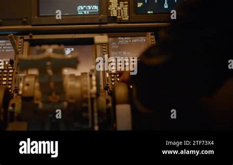 Male Copilot Inserting Flight Coordinates To Arrive At Destination Using Dashboard Command For