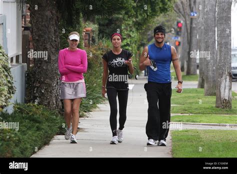 Katie Price Aka Jordan Peter Andre And A Friend Being Filmed Completing A Mile Run From