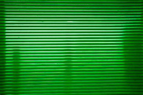 녹색 또는 에메랄드 색상 질감 패턴 추상 배경 벽 종이 화면 보호기 안내 책자 표지로 사용 될 수 있다 또는 프레 젠 테이 션 배경 또한 공간이 복사 텍스트에 대 한 가죽에