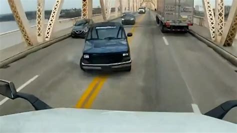 Dashcam Of Bridge Crash Shows Collision And Truck Dangling Over Ledge
