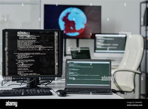 Close Up Of Computer Monitor With Codes On The Screen Standing On Table Of Developer Stock Photo
