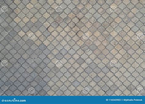 The Texture Of A Rhythmic Mosaic Made Of Concrete Tiles Background Image Of A Large Area Of Old