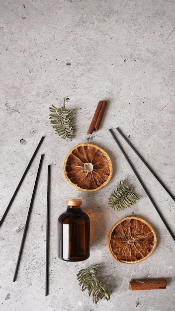 Premium Photo Citrus Reed Diffuser With Cinnamon Dry Orange And Fir