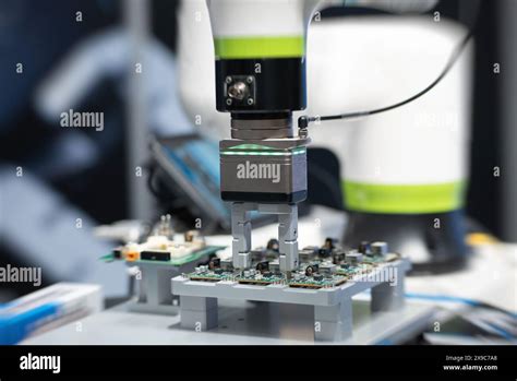 Microchip And Microprocessor Assembly With Automated Robotic Arm