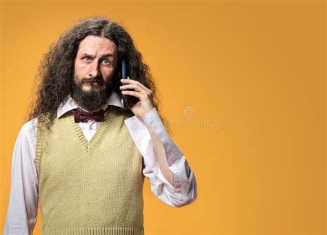 Confused Nerd Talking On A Mobile Phone Stock Photo Image Of Geek Eyeglasses