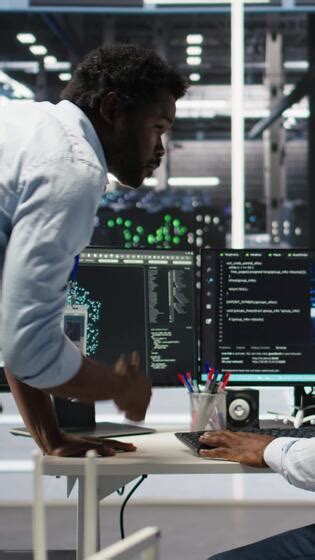 Pleased Data Center Manager Praising Work Done By Engineer Using Neural Network Models To