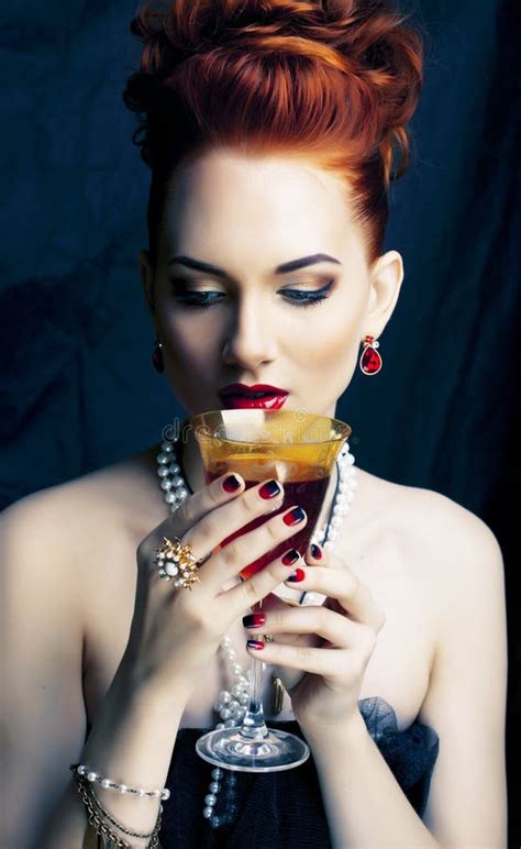 Beauty Stylish Redhead Woman With Hairstyle And Manicure Wearing Jewelry Pearl Close Up Stock