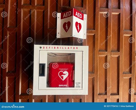 An Automated External Defibrillator And Fire Extinguisher Editorial Photo
