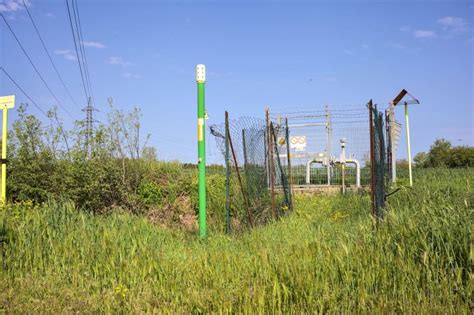 Methane Pipeline In A Field In The Italian Countryside In Spring Stock