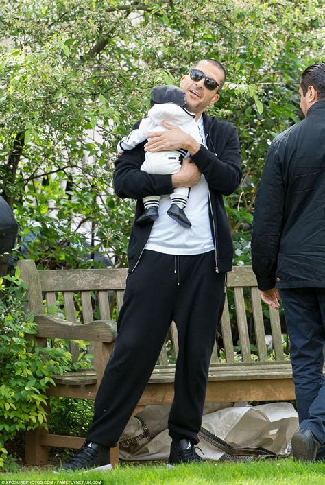 Wissam Al Mana Enjoys A Stroll With Son Eissa In London