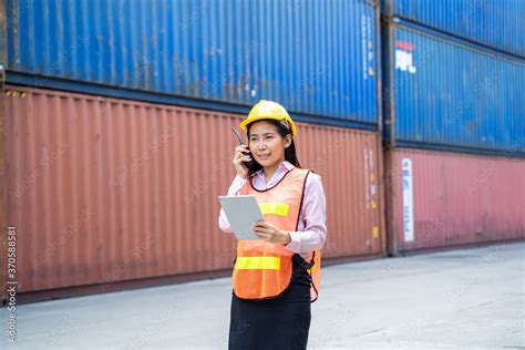Contenner Woman Worker With Laptop Checking Position Loading Containers Box Large Container
