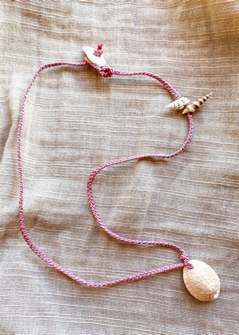 Single Special Seashell Pendant Strung And Knotted On Finely Braided