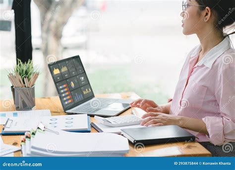 The Data Analyst Woman Working On A Business Analytics Dashboard Utilizing Charts And Metrics