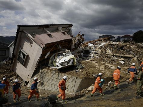 日本暴雨成灾增至129死59失踪 安倍取消外访坐镇救灾 星岛日报