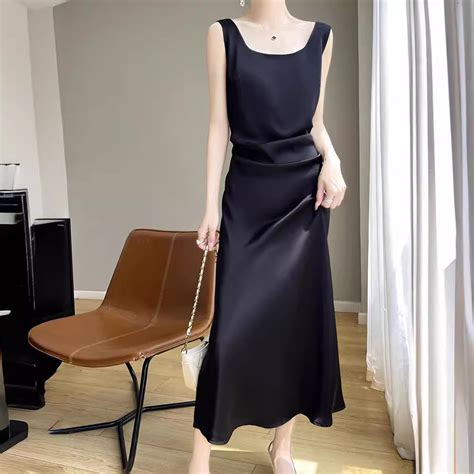 The Timeless Elegance Of The Black Silk Dress Styling Care And